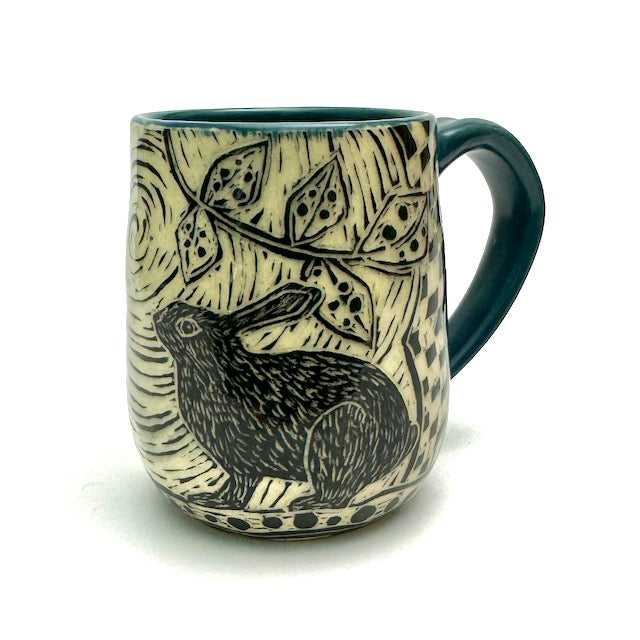 Mug #23 - Woodcut Rabbits with Teal Blue Glaze – Patricia Griffin Studio